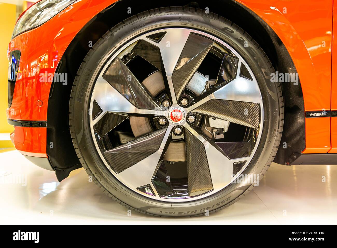 Singapore. March 2019. Orange Jaguar I-Pace all electric SUV. Side view ...