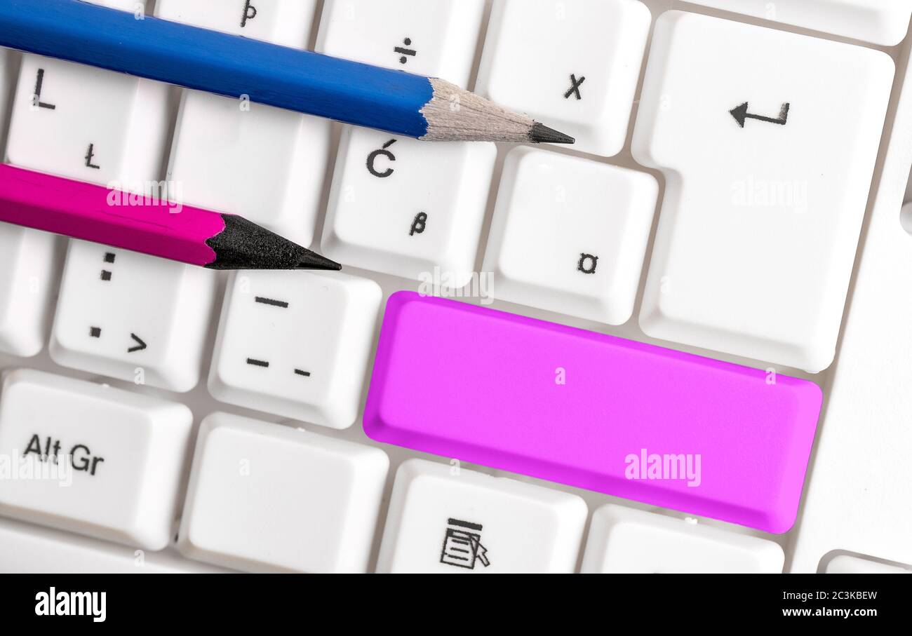 Different Colored Keyboard key With Accessories Arranged On Empty copy ...