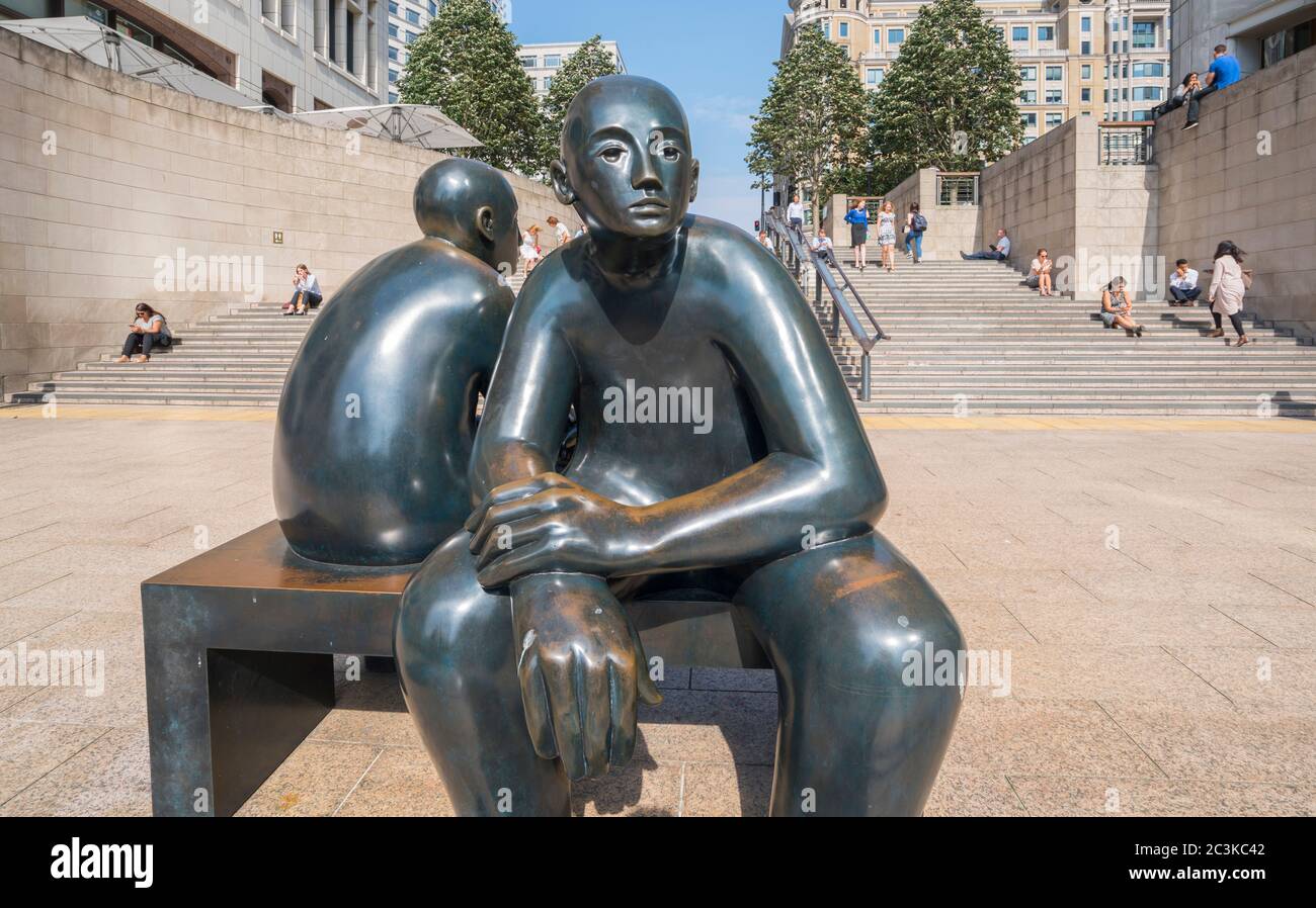 Statue of two sitting men at Cubitt steps in Canary Wharf - LONDON ...