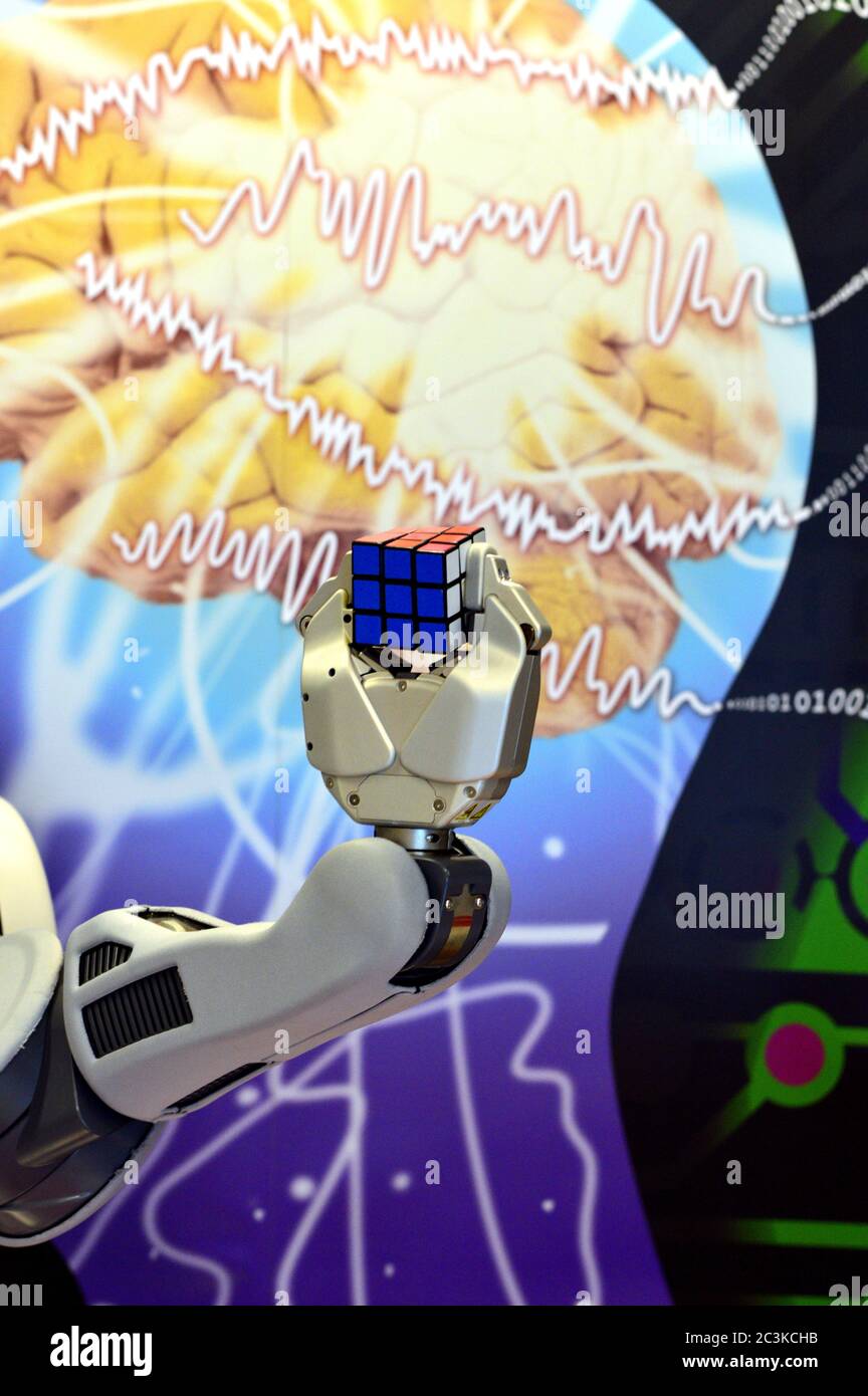 Londonderry, UK. Feb. 2017. Robot holding a Rubik's Cube with ...