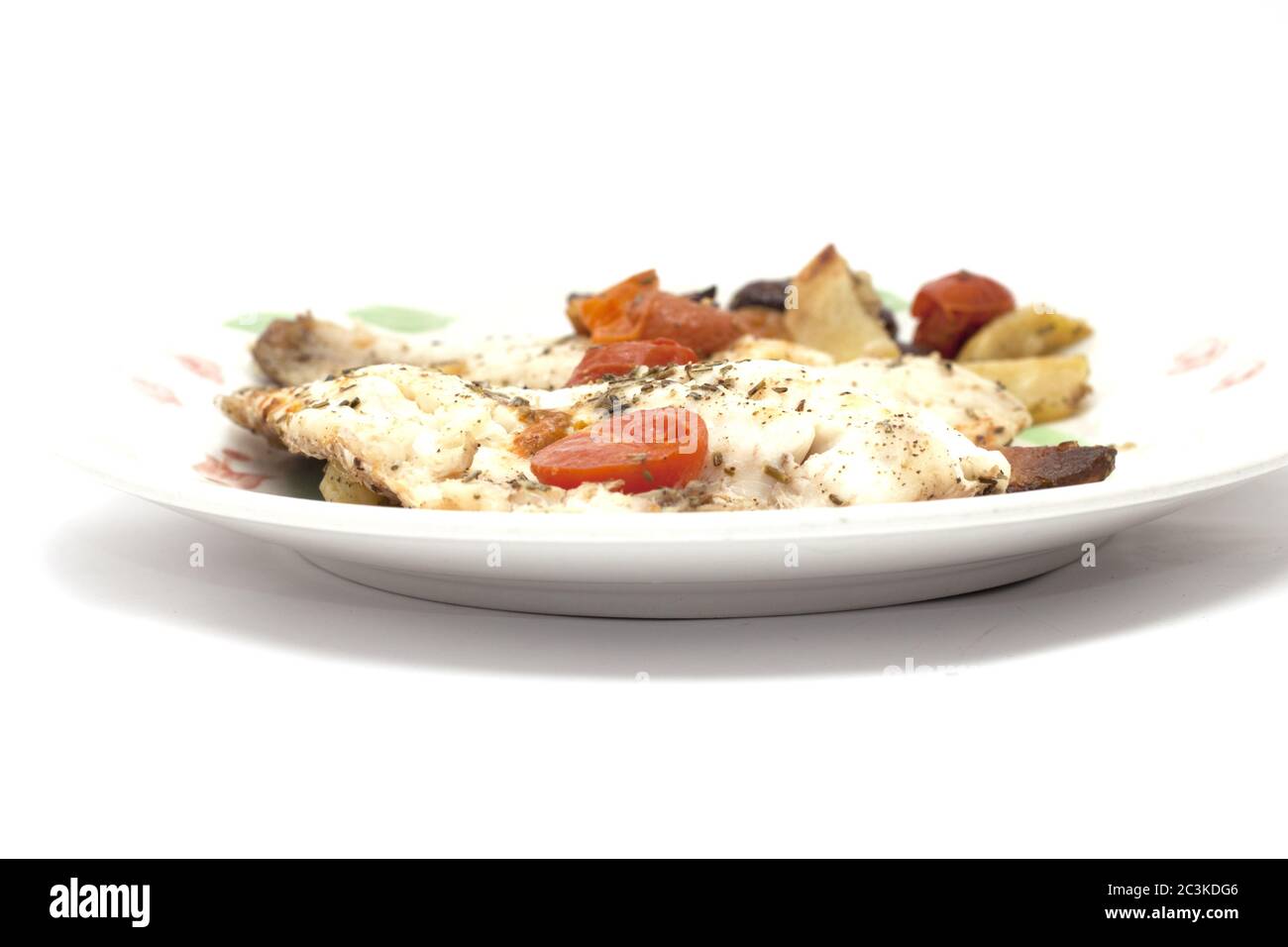 Tasty perch fillet steamed with cherry tomatoes Stock Photo - Alamy