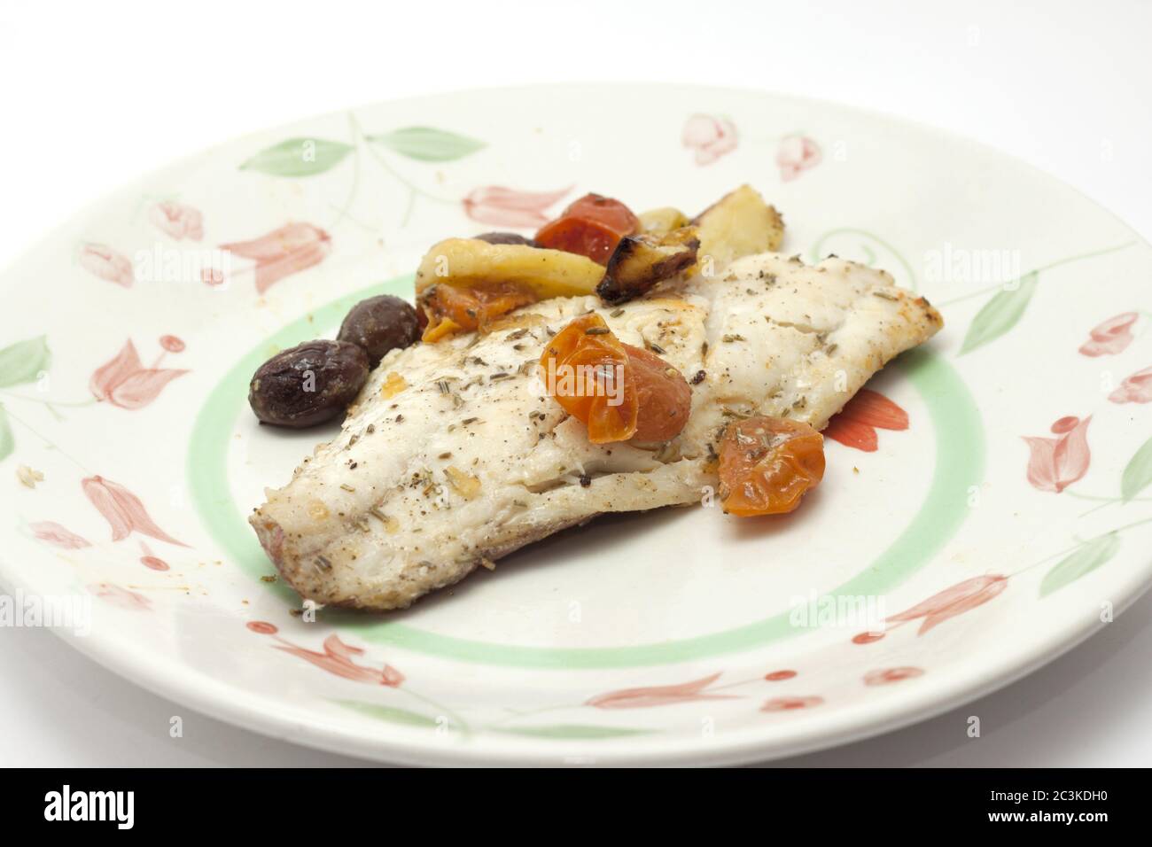 Tasty perch fillet steamed with cherry tomatoes Stock Photo - Alamy