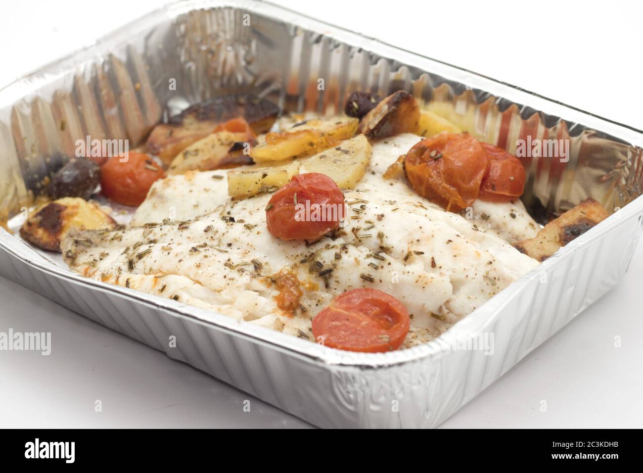 Tasty perch fillet steamed with cherry tomatoes Stock Photo - Alamy