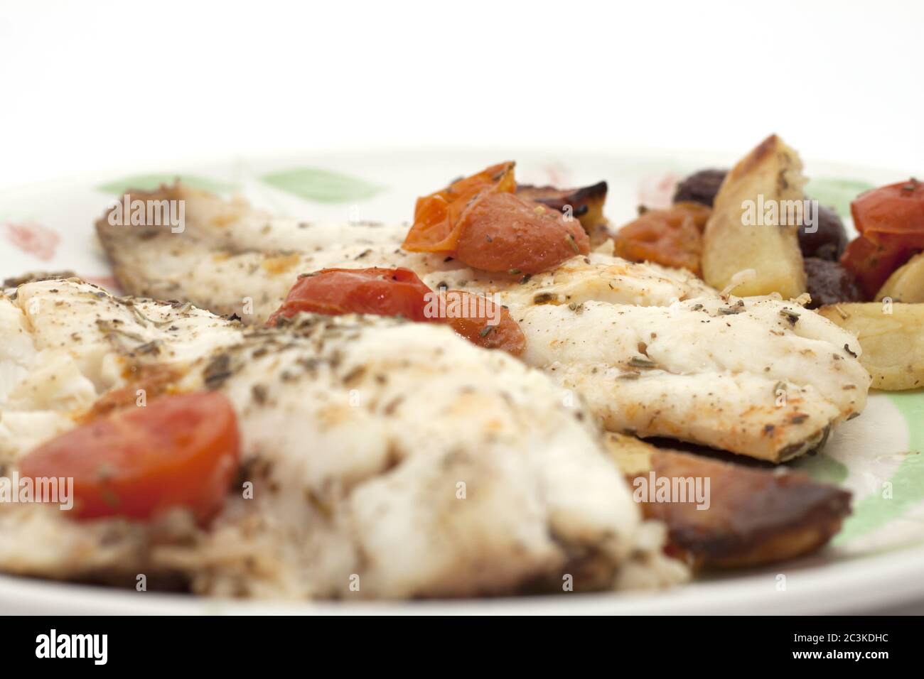 Tasty perch fillet steamed with cherry tomatoes Stock Photo - Alamy