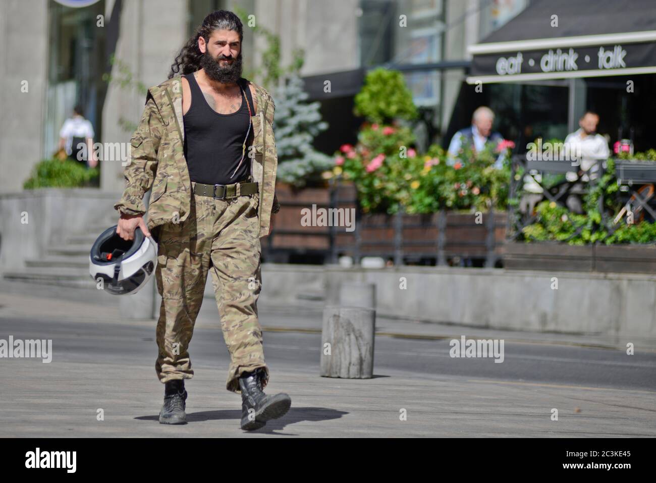 Armenian man wearing military clothes and carrying a helmet, Northern ...