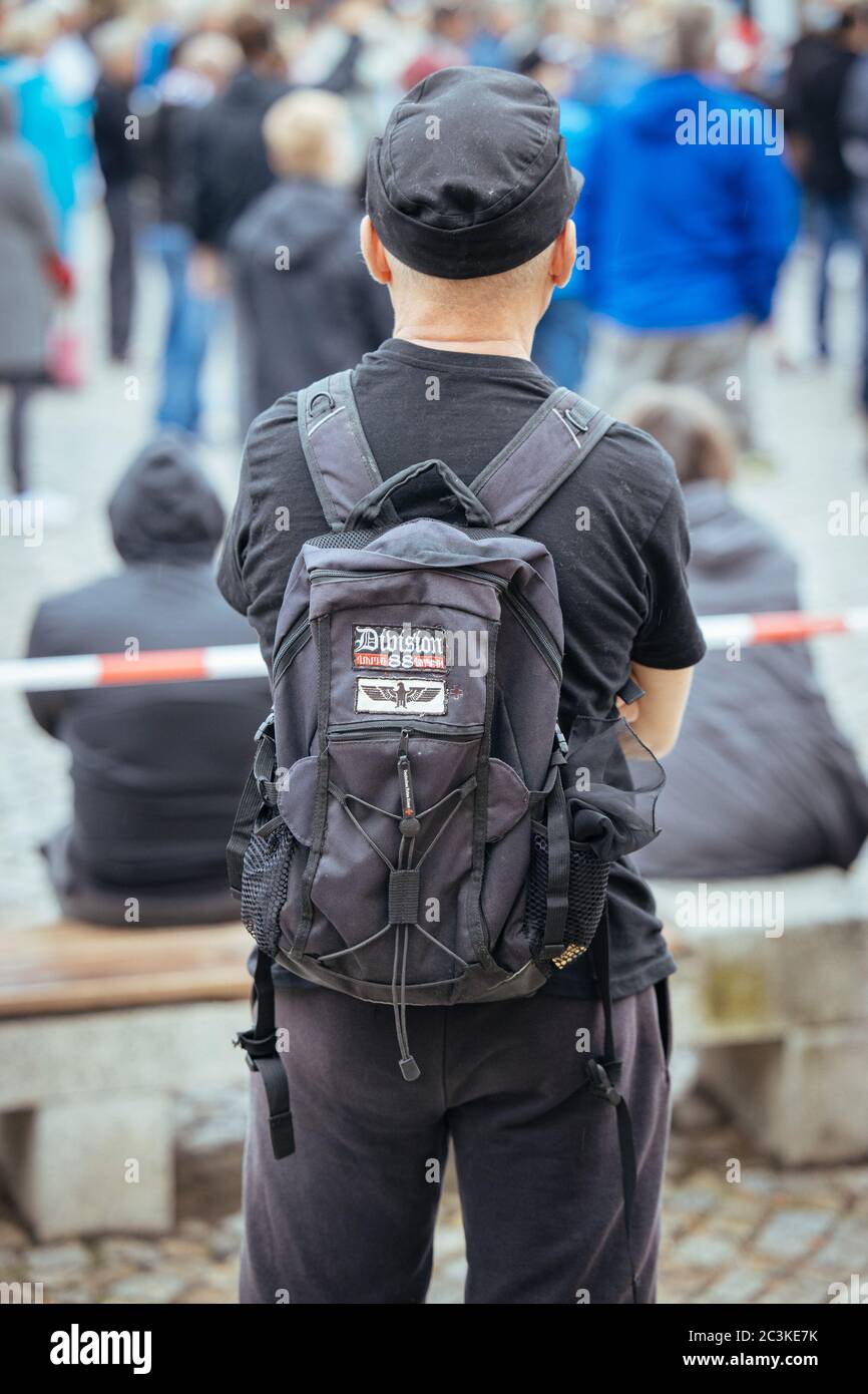 Senftenberg, Germany. 19th June, 2020. A participant of an AfD rally ...
