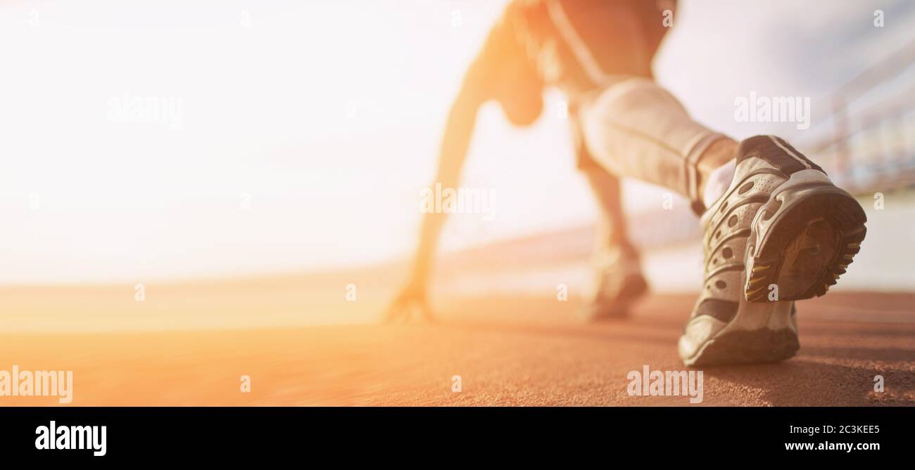 Runner at the start hi-res stock photography and images - Alamy