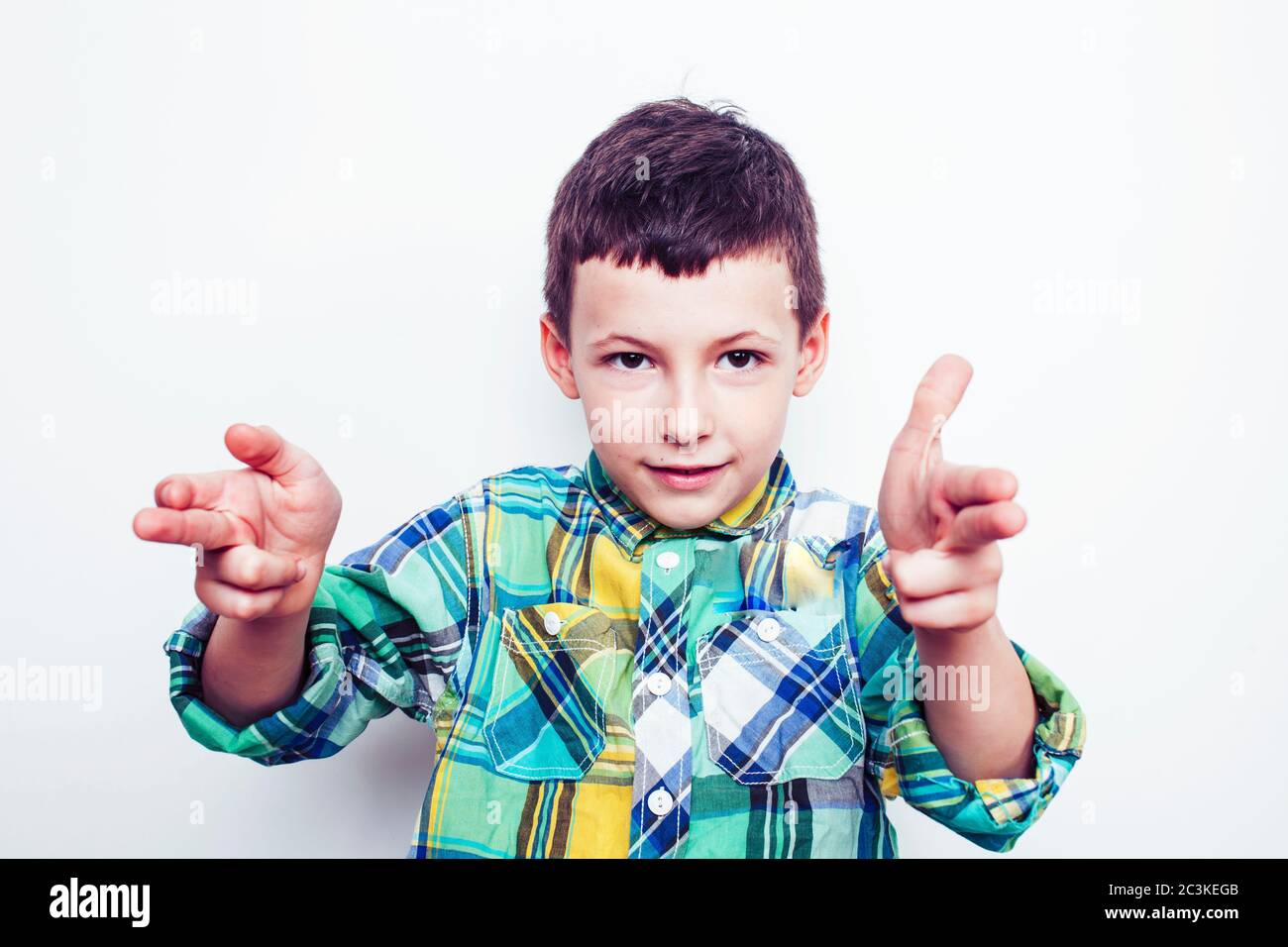 little cute real boy on white background gesture smiling close up ...