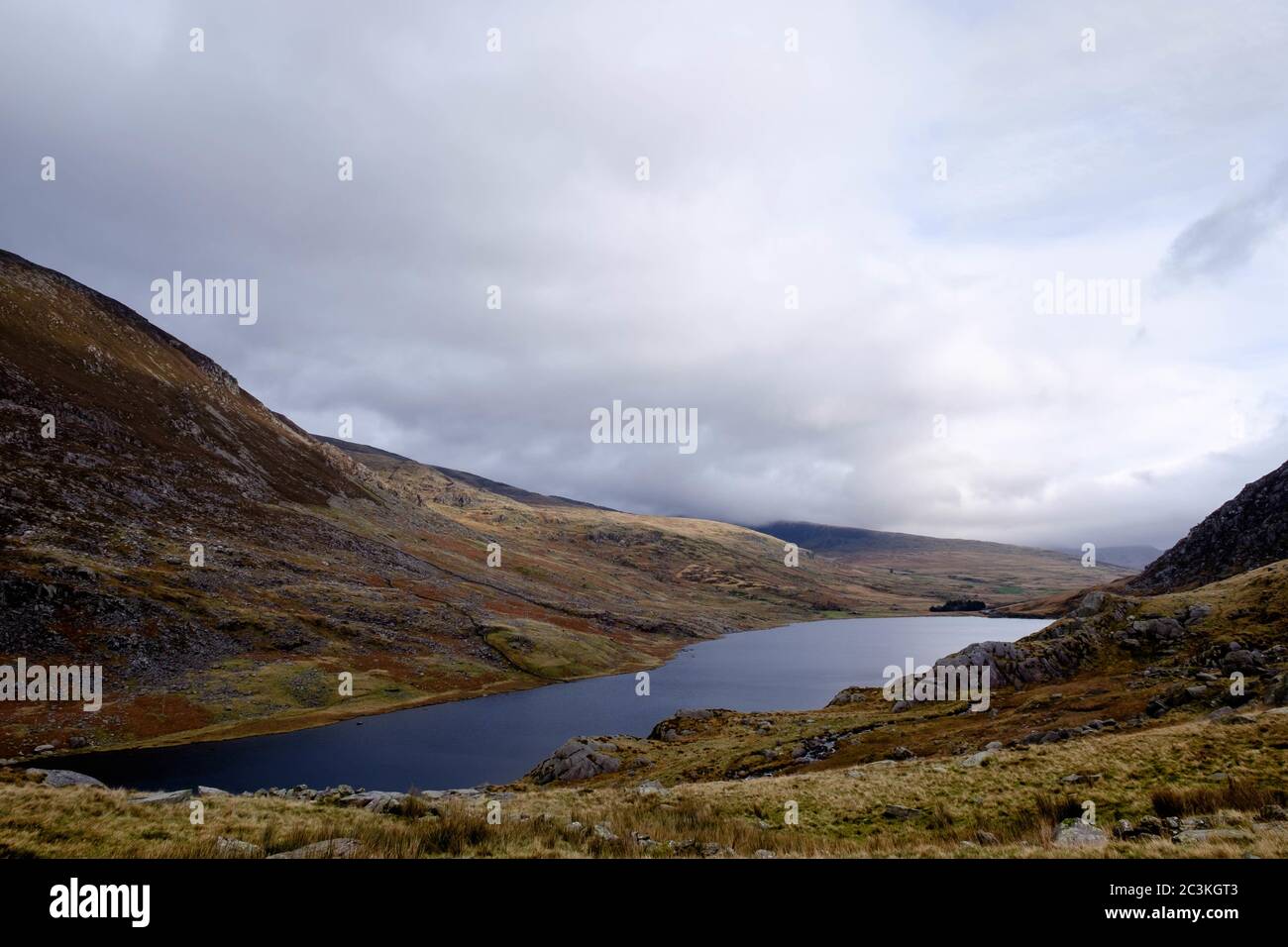 Breathtaking view of a lake surrounded by hills in National Trust ...