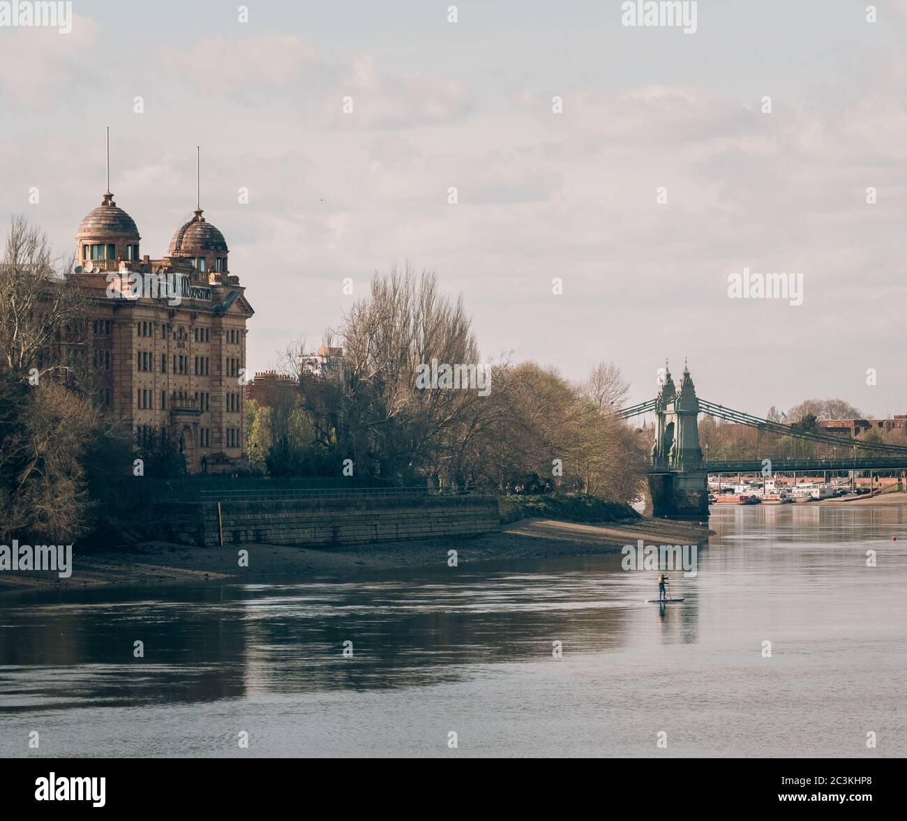 Magnificent old castle captured by a bridge over a beautiful river on a ...
