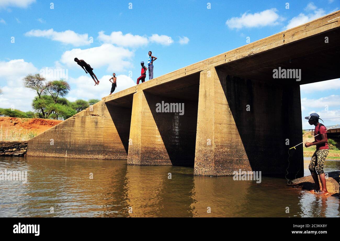Boys take a dip in the Palala river in Limpopo province of South Africa ...