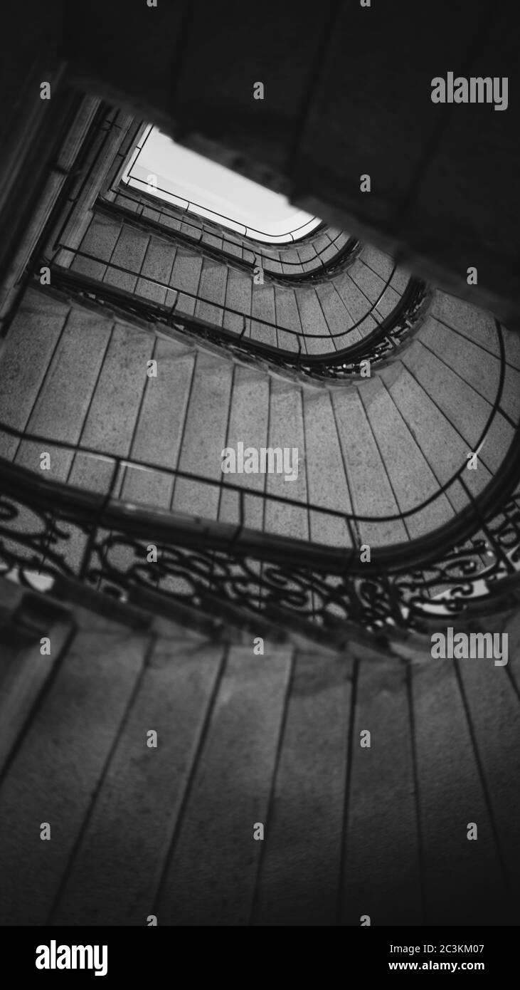 Vertical grayscale picture of a repetitive stairs Stock Photo - Alamy