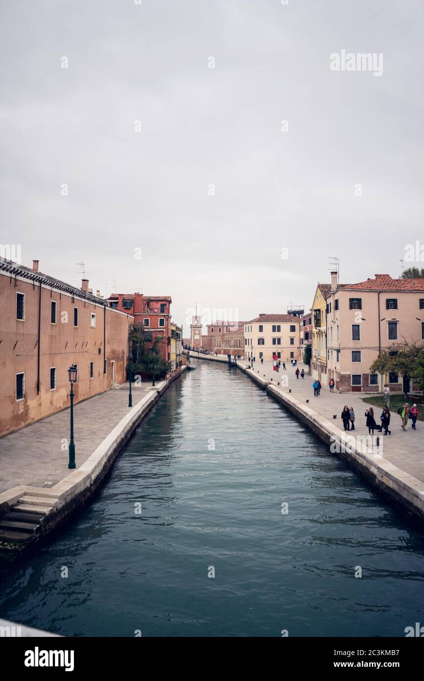 Vertical picture of a grand channel between buildings Stock Photo - Alamy