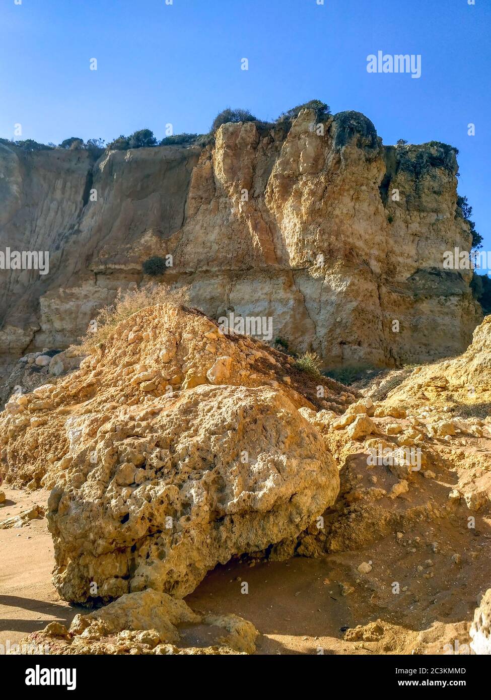Vertical shot of rock formations on the coast of the sea Stock Photo ...