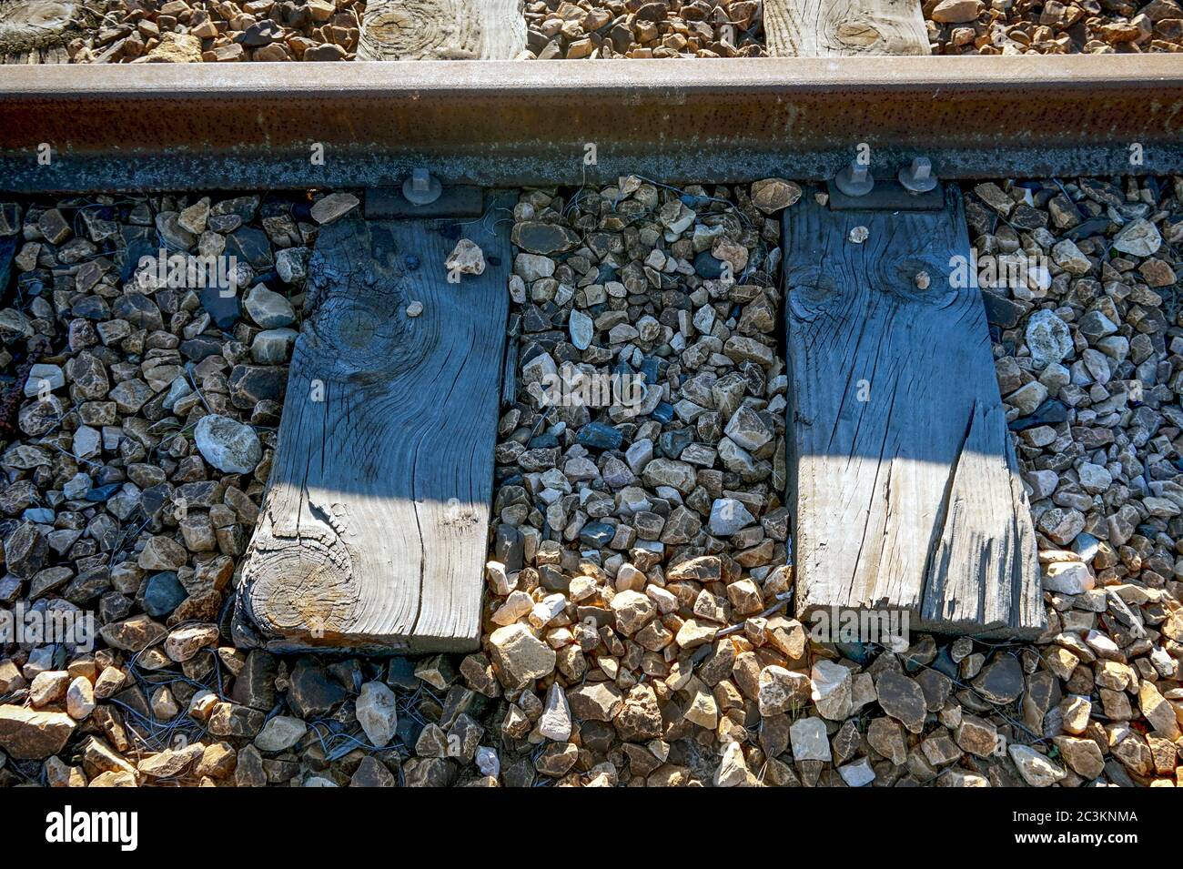 Closeup shot of a railroad track Stock Photo - Alamy