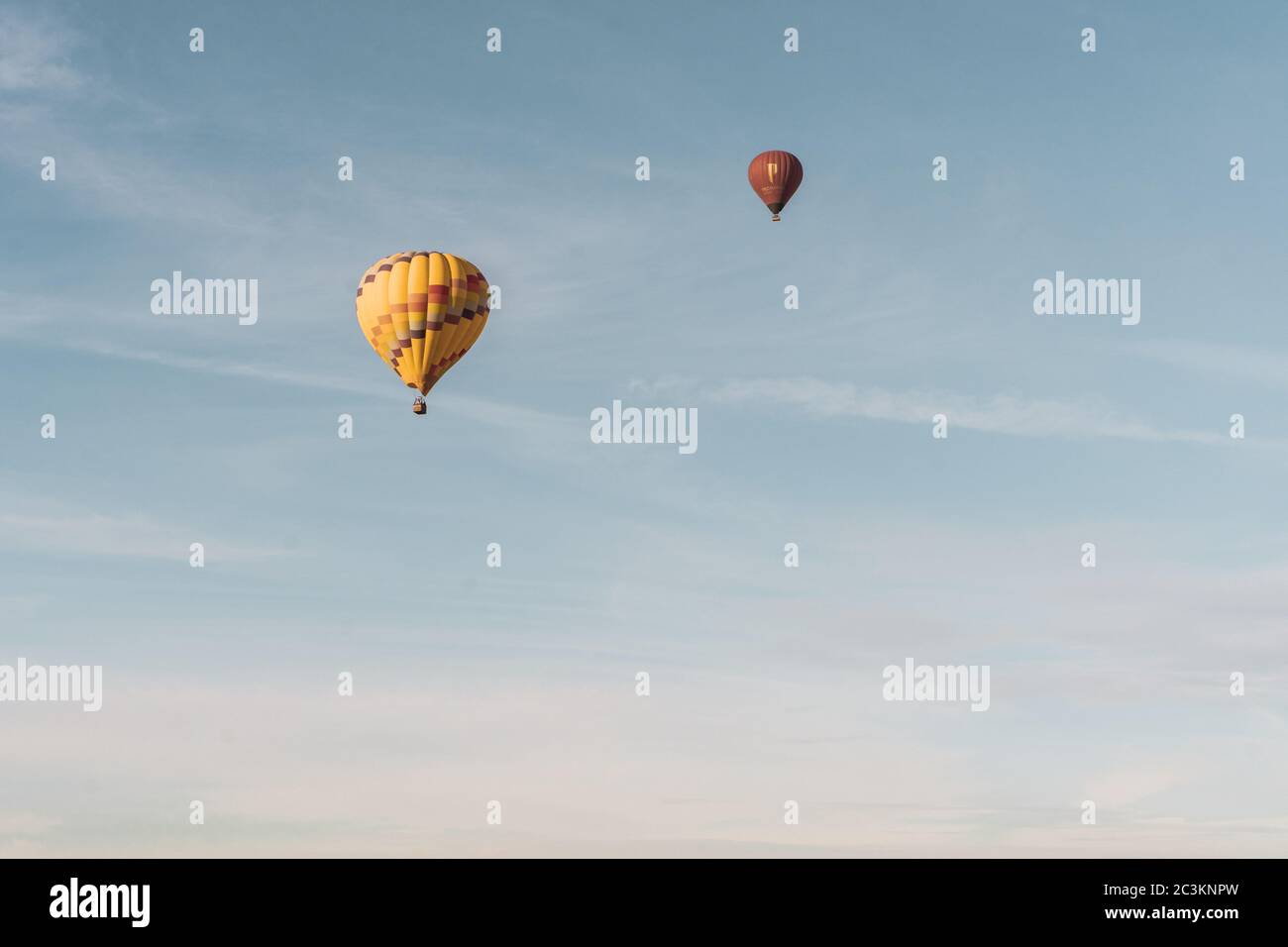 Parachutes flying up in the air during daytime Stock Photo - Alamy