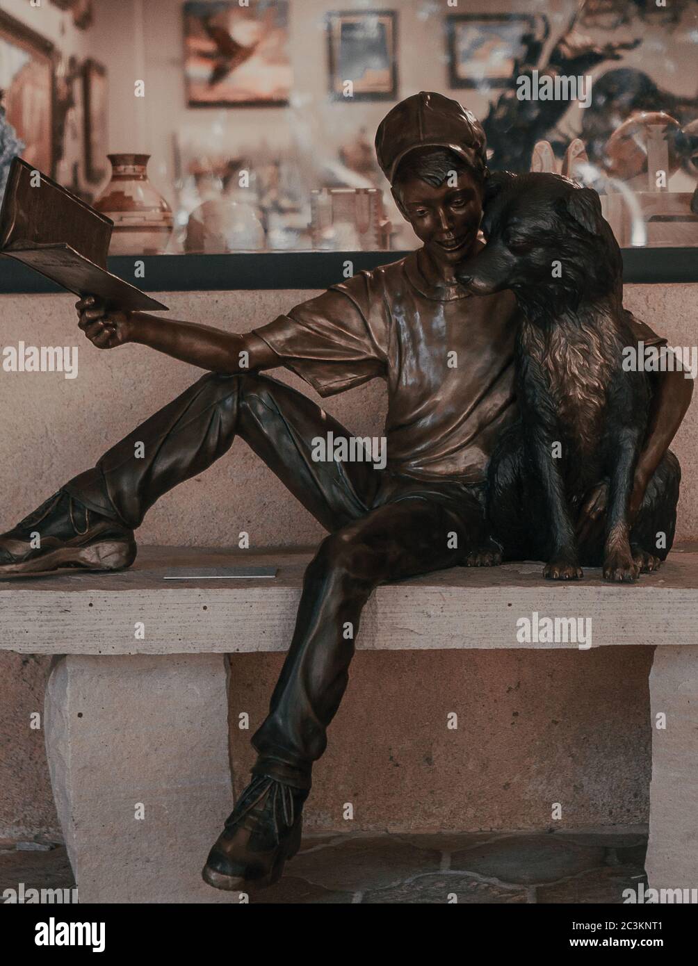 Book and dog statue hi-res stock photography and images - Alamy