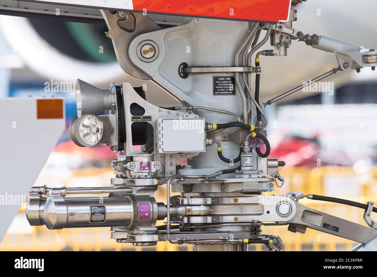Singapore - February 16, 2016: Side view of the nose landing gear of an ...