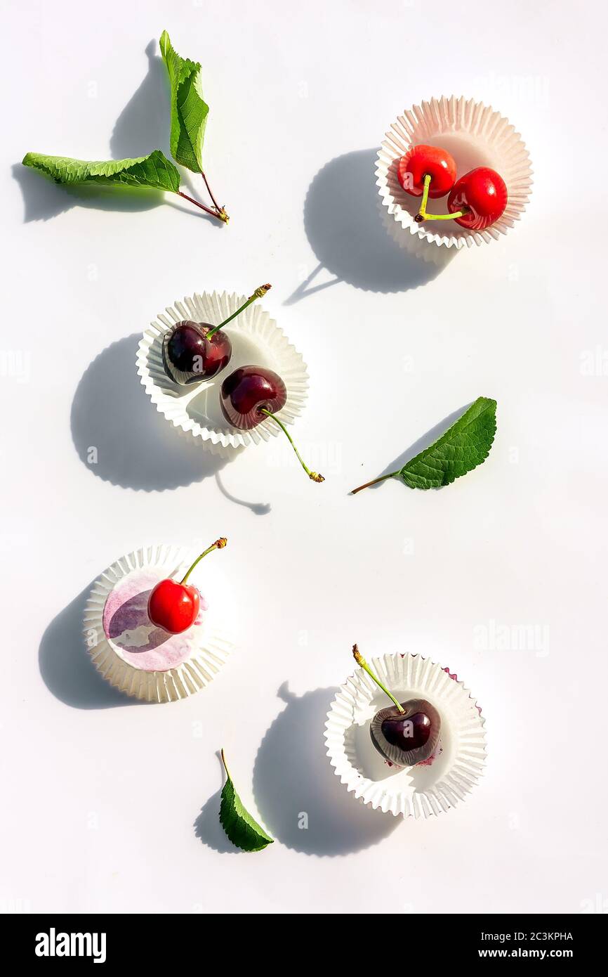 Summer creative cherry layout. Ripe cherry fruit on white background ...