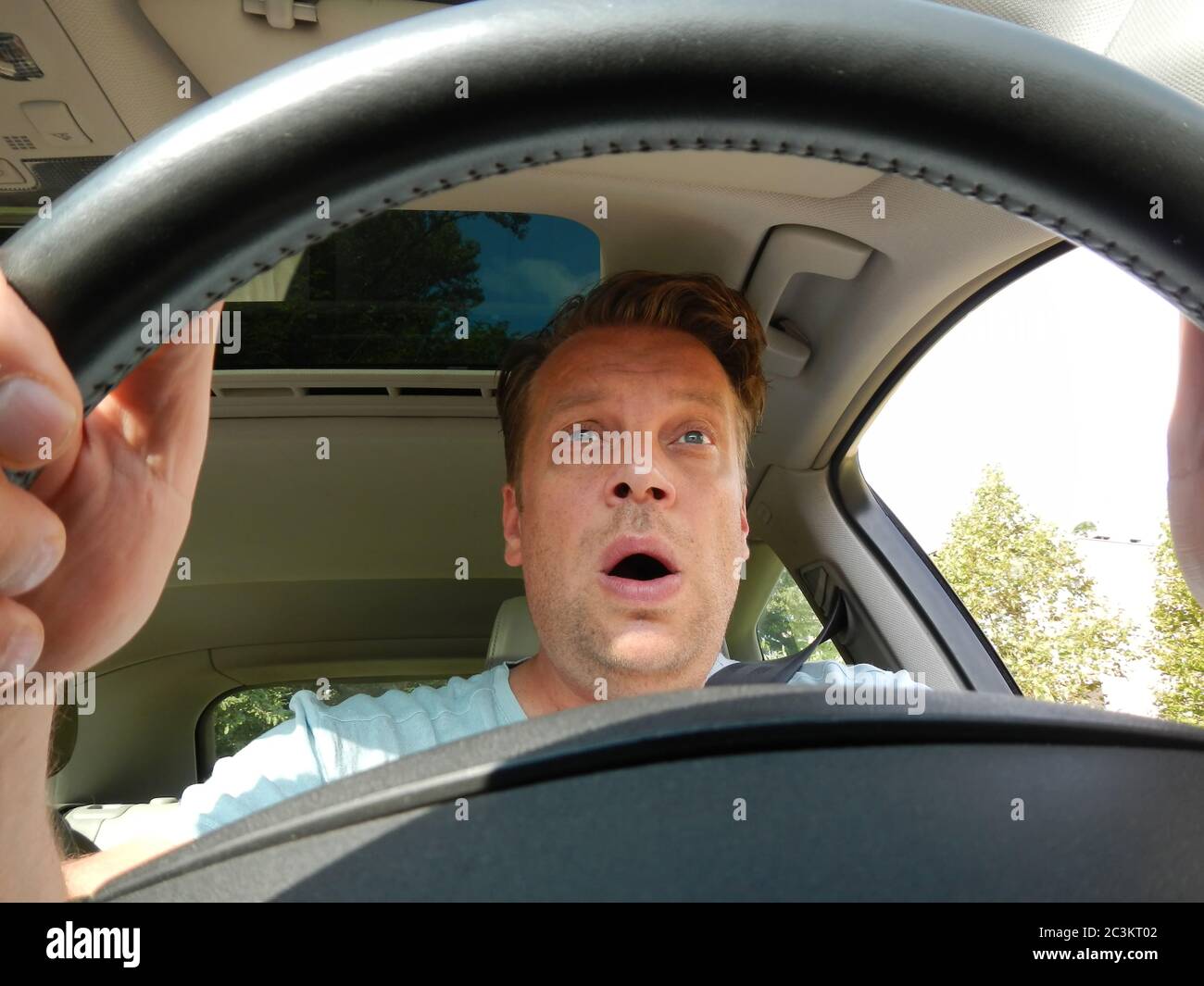 Surprised face driver hi-res stock photography and images - Alamy