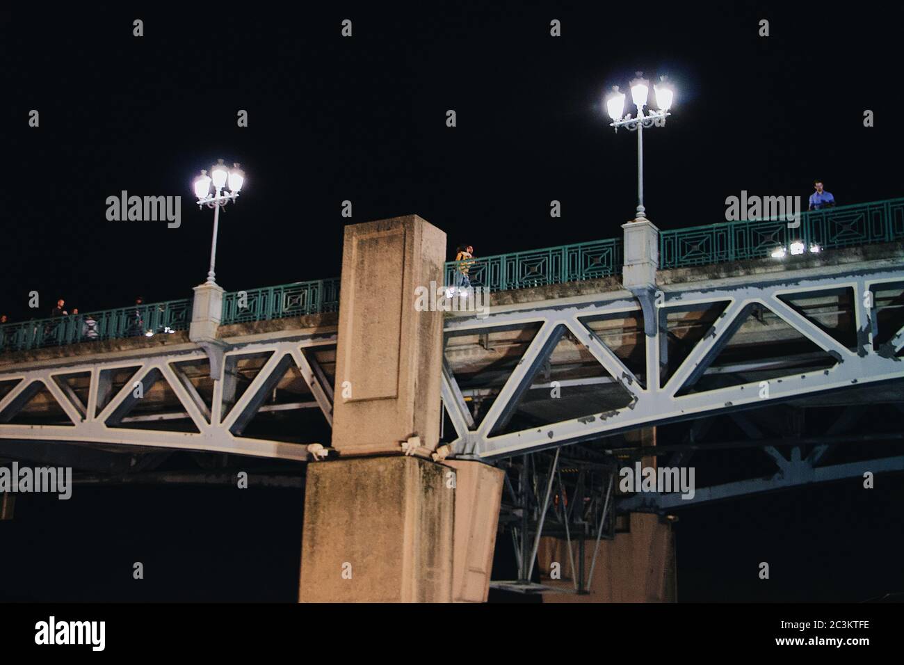 Bridge with street lights in an urban city at night Stock Photo - Alamy