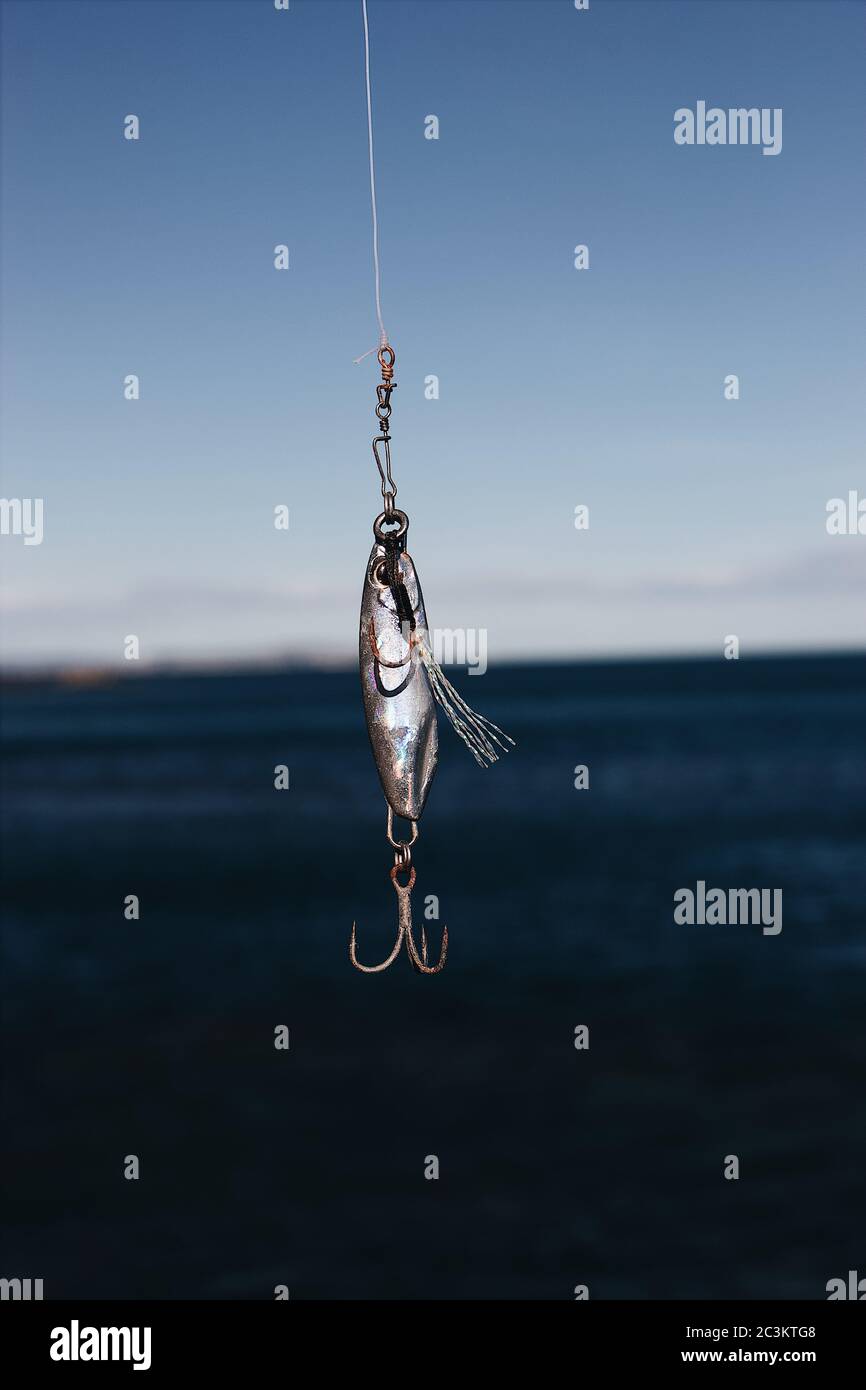 Hanging fish shaped sign hi-res stock photography and images - Alamy