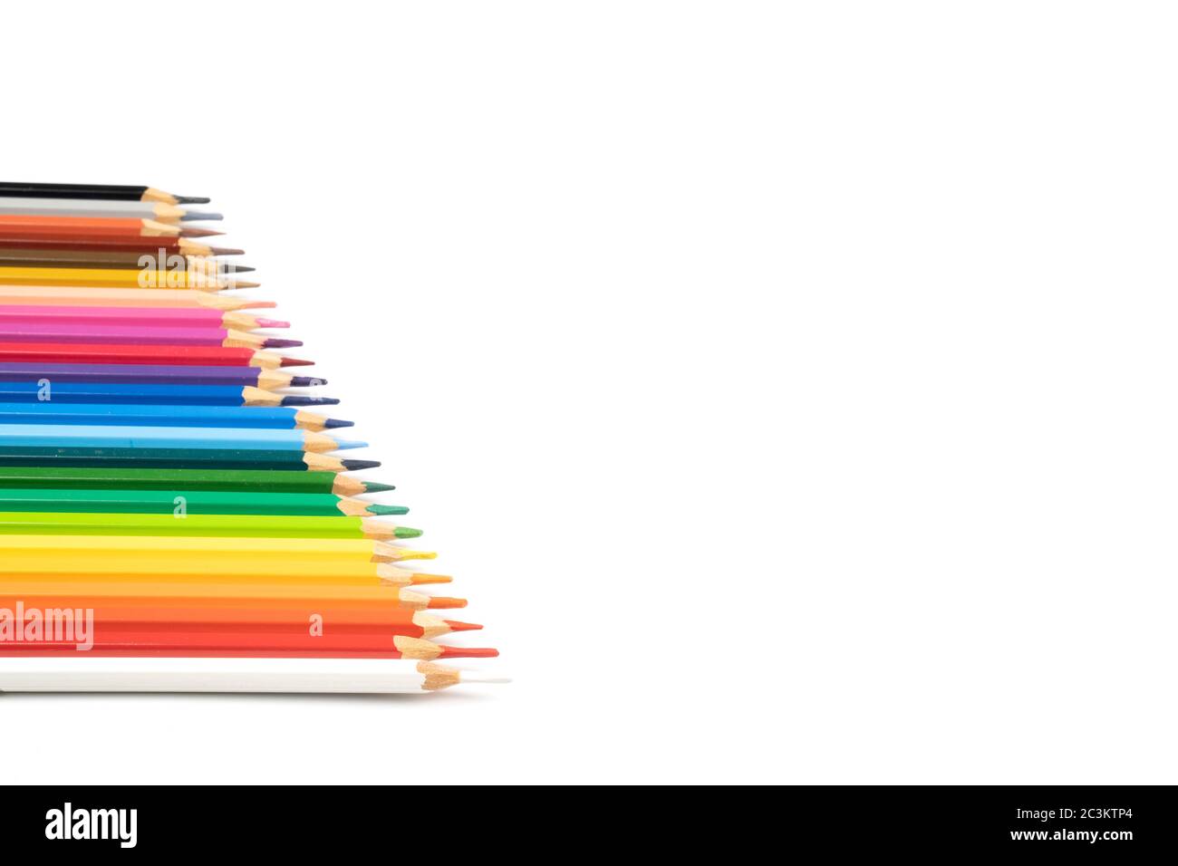 blunt colour pencils are arranged in the line on the white background ...