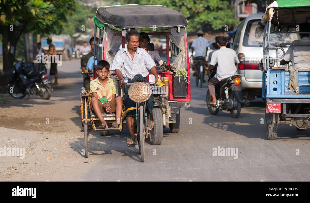 Sittwe, Rakhine State, Myanmar - October 15, 2014: Bicycle taxi ...