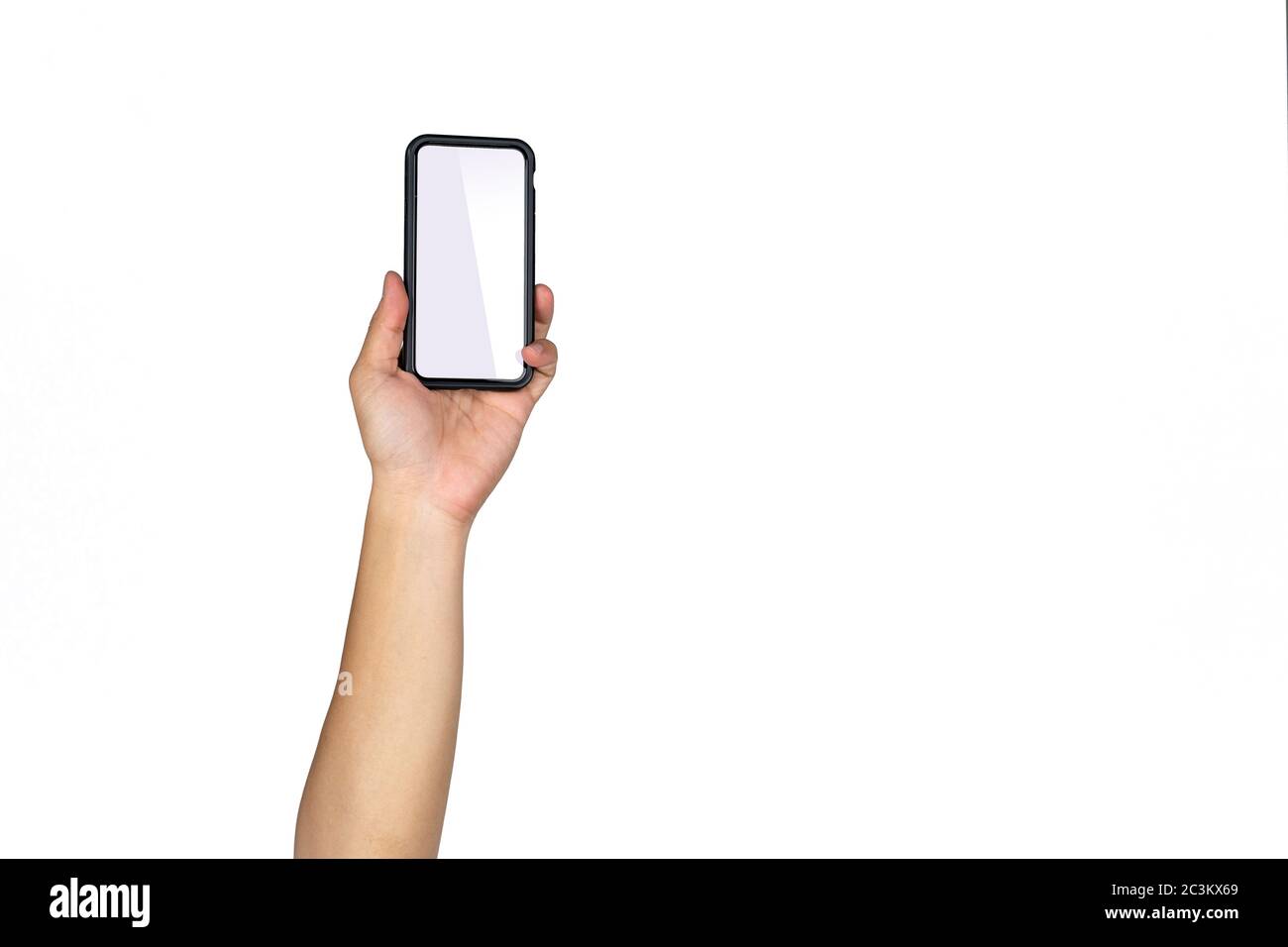 Asian Thai male isolated hand hold Smart mobile phone and raise up in ...