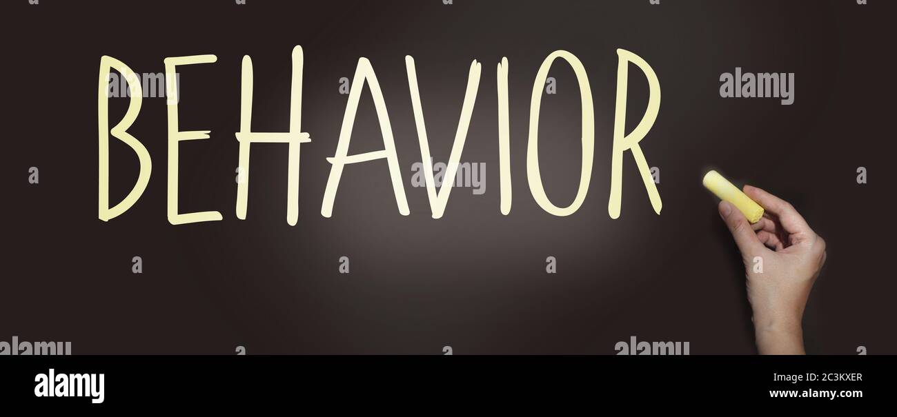 The word Behavior handwriting with chalk on blackboard. Psychology ...