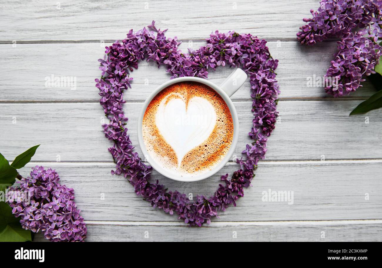 Bouquet lilacs cup coffee hi-res stock photography and images - Alamy
