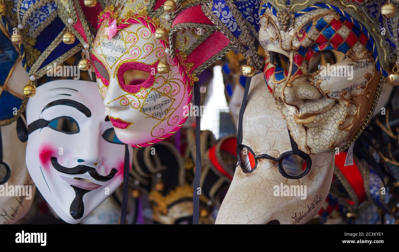Colorful carnival masks on the market in Venice, Italy. Masks were worn ...
