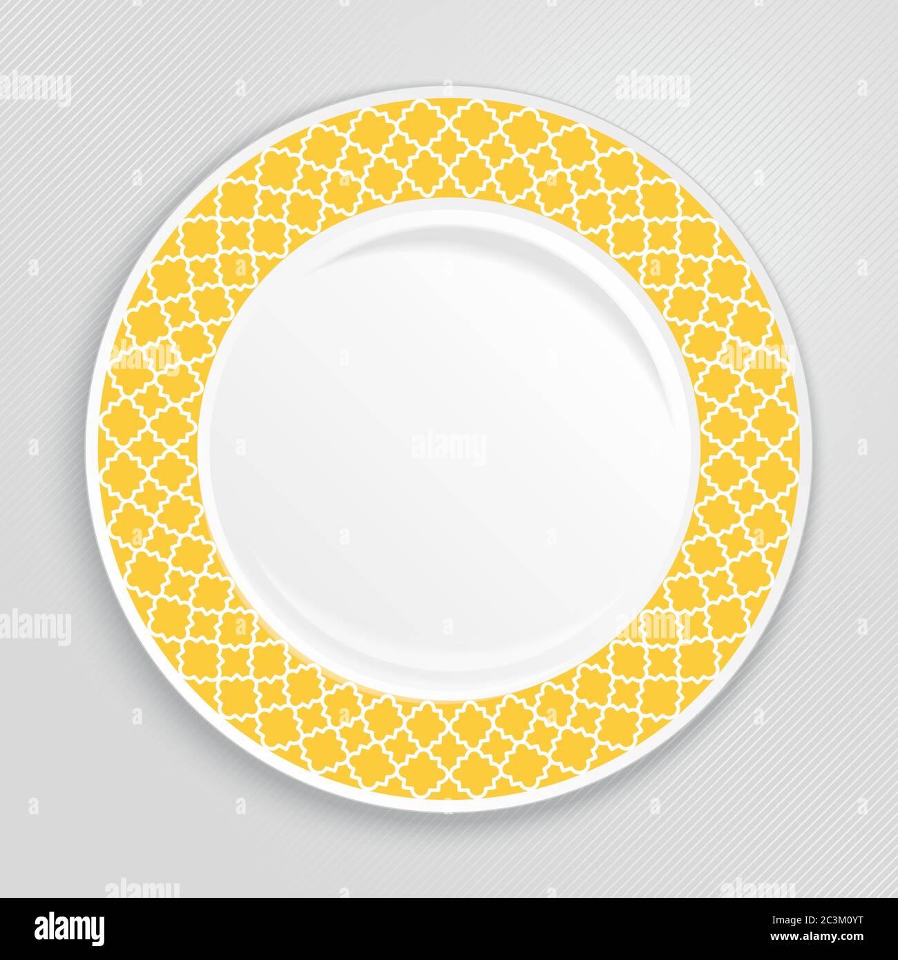 Decorative plate with patterned border, on gray background, top view ...