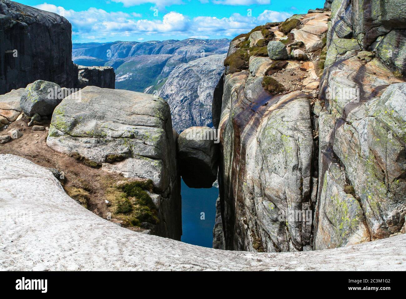 Close view of the famous boulder Kjeragbolten above the Lysefjorden on ...