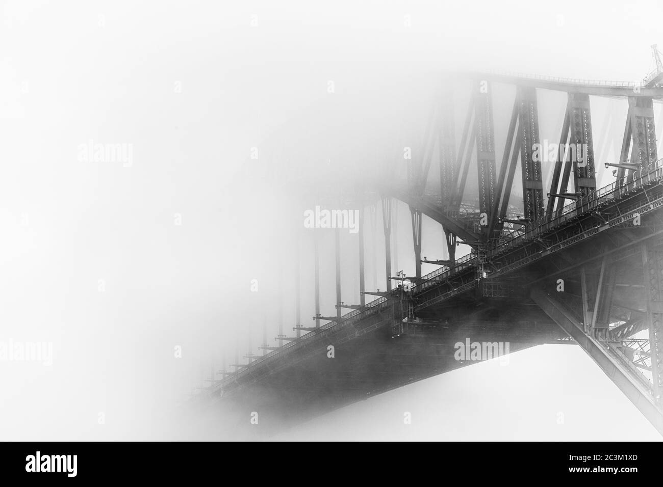 Fog over Sydney Harbour Bridge Stock Photo - Alamy