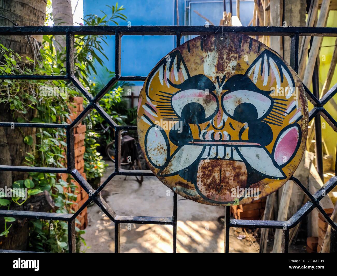 Clay Decorative Hanging on iron gate. Also called as Drishti Bommai ...