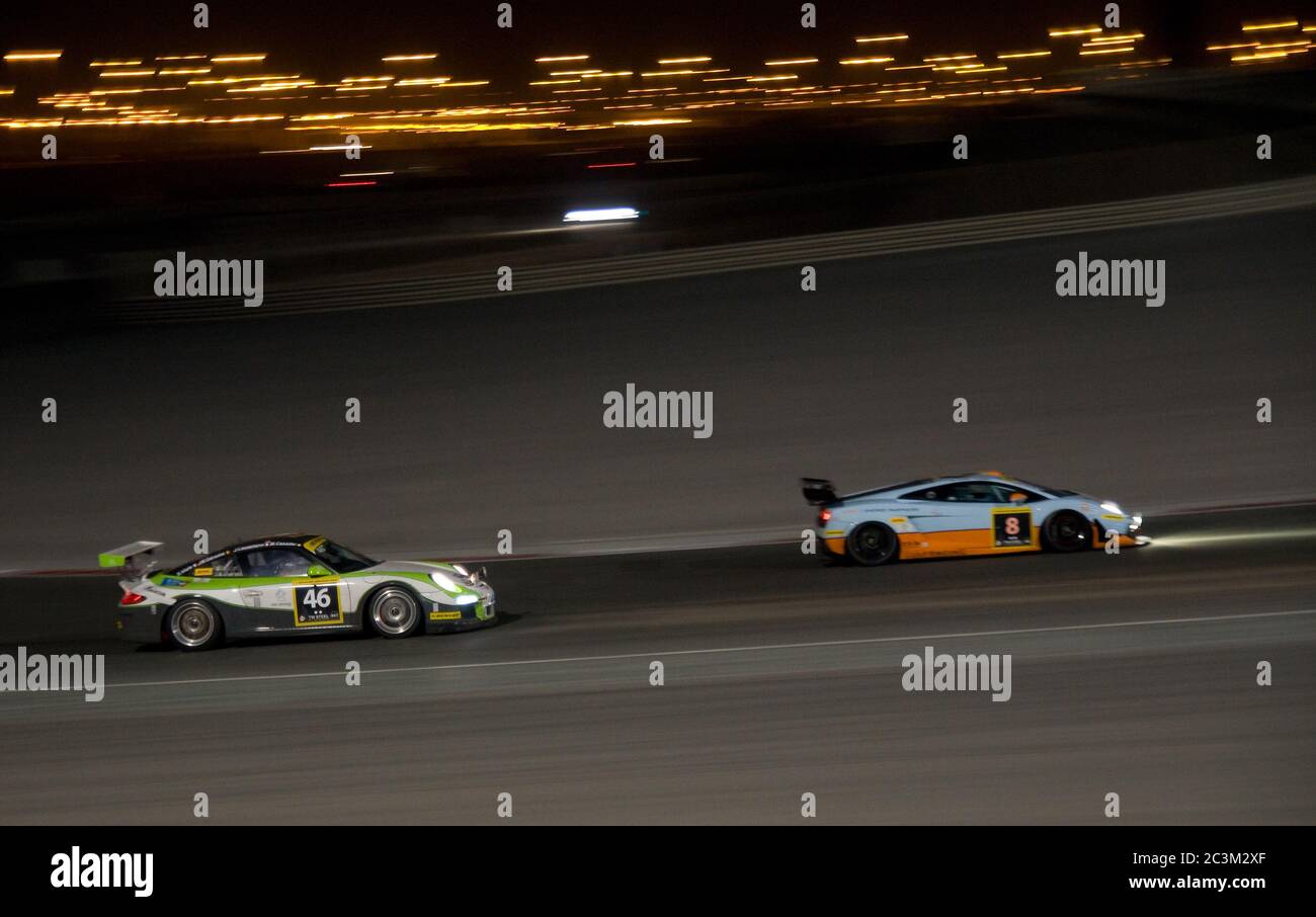 DUBAI - JANUARY 13: Porsche 997 GT3 Cup and Lamborghini Gallardo LP600 ...