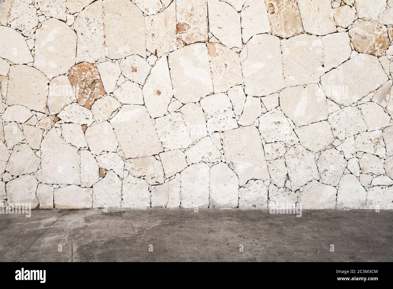 Outer wall made of shell rock and concrete floor, empty interior ...