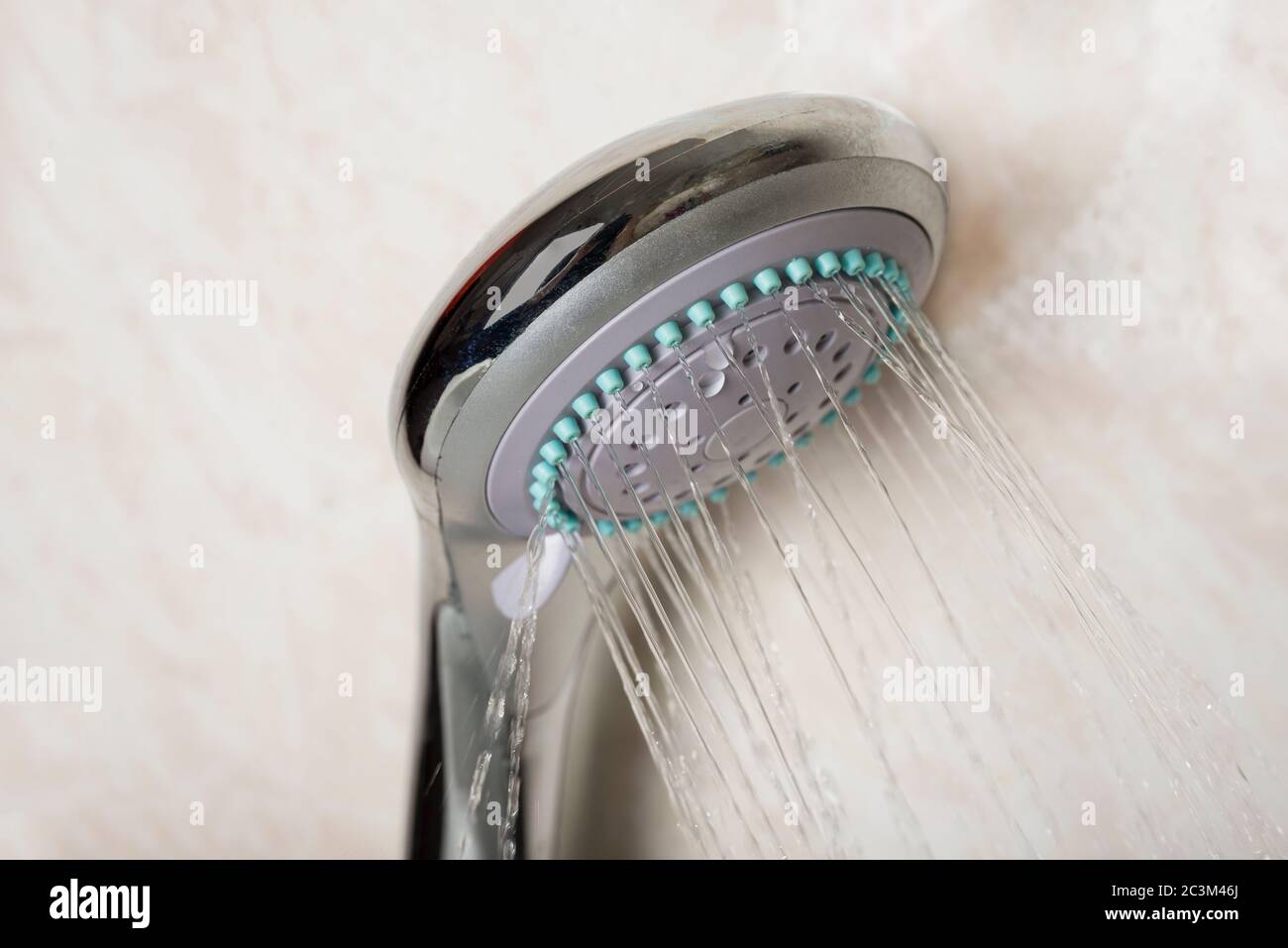 Shower head with running water in a bathroom Stock Photo - Alamy