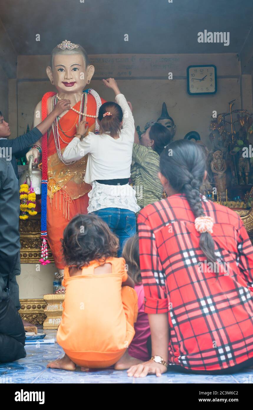 PAILIN - APRIL 14: Buddhists decorating an image of Grandma Yat to show ...
