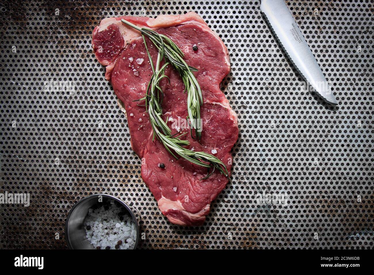 Top view of raw steak meat with herbs Stock Photo - Alamy