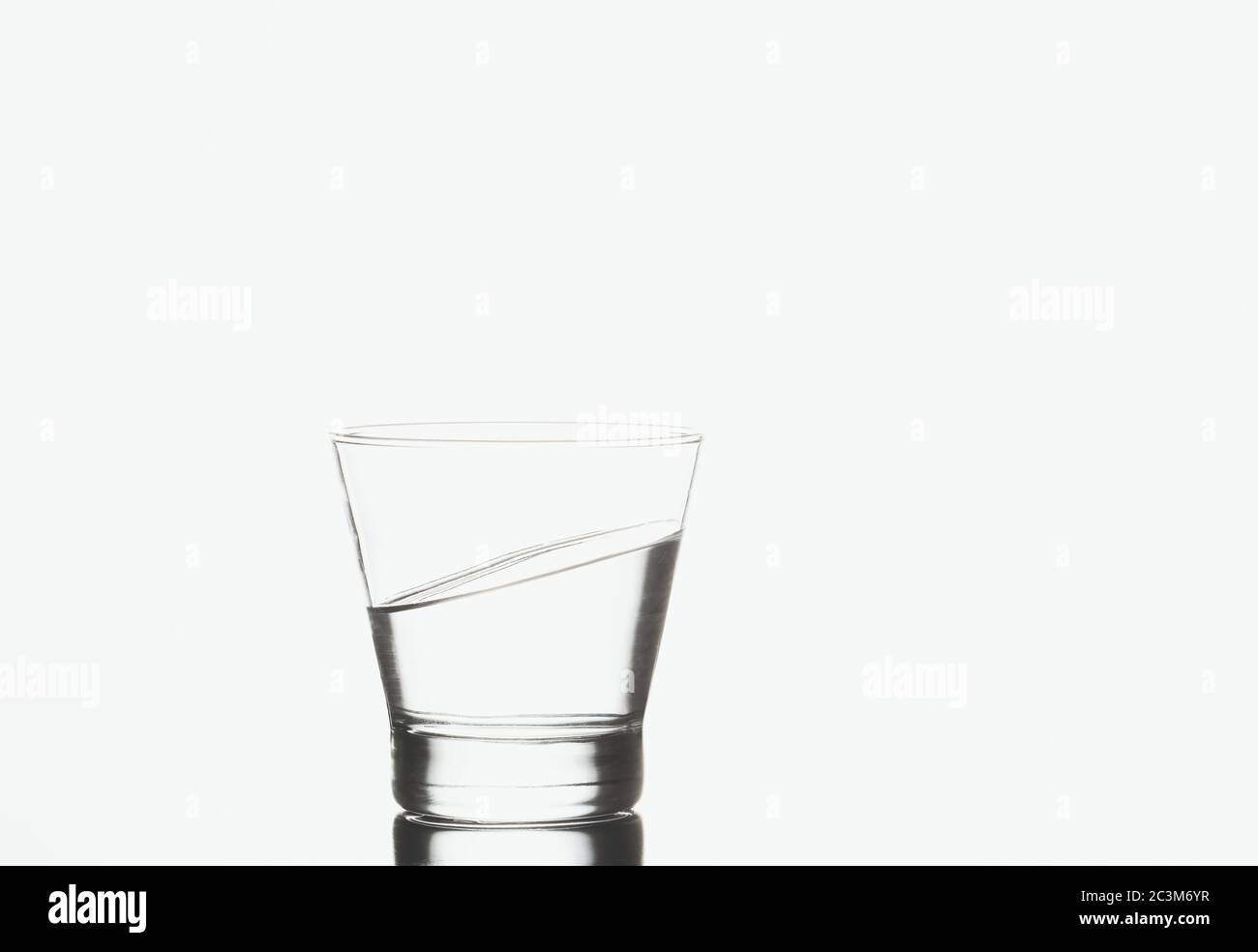 Closeup shot of a water glass isolated on white background Stock Photo ...