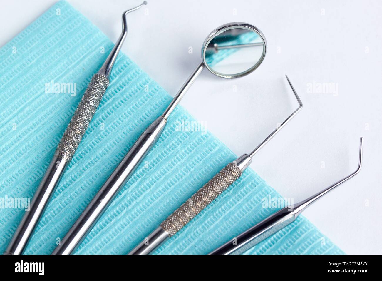 Group of dental tools for the treatment of teeth. Isolated on white ...