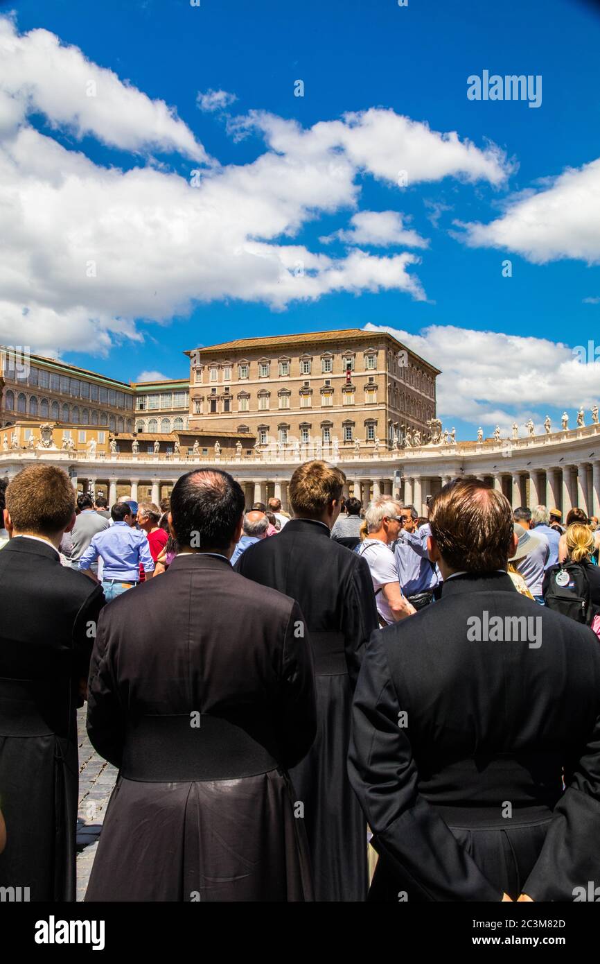 Priests in St Peter's Square during the Pope's Sunday prayers and ...