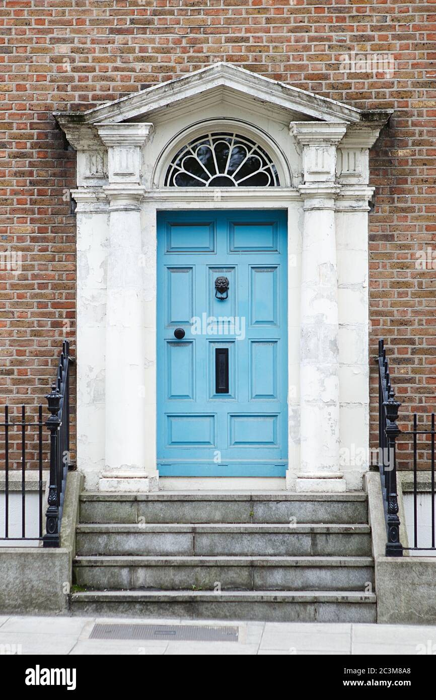 A blue door in Dublin, Ireland. Arched Georgian door house front in ...