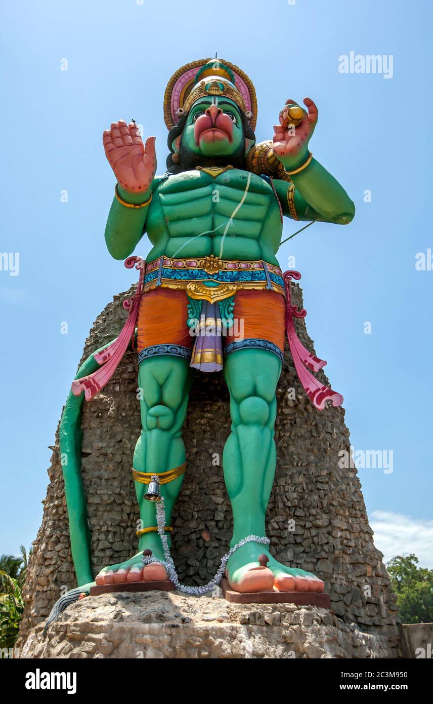 A giant statue of the Hindu monkey god Hanuman on the roadside at ...