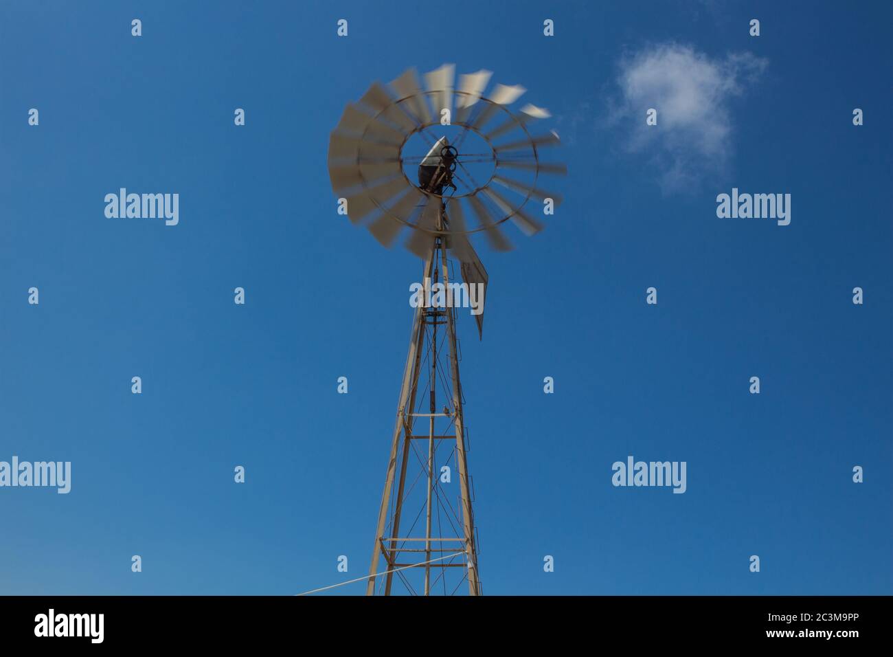 Windmill for water pump irrigation in Cyprus Stock Photo - Alamy