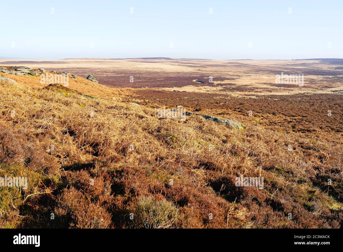 A view from Stanage Edge of a misty Derbyshire countryside dressed in ...