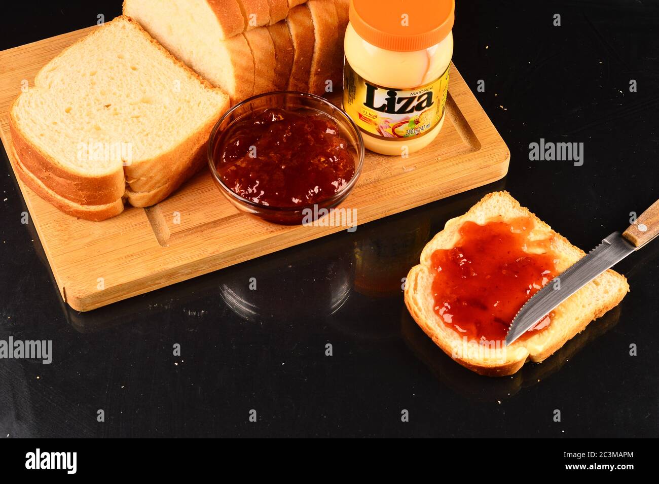 Eating jam and bread hi-res stock photography and images - Alamy