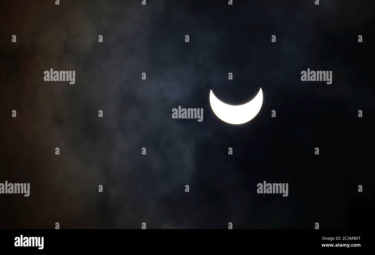 Kathmandu, Nepal. 21st June, 2020. A partial solar eclipse is seen in ...